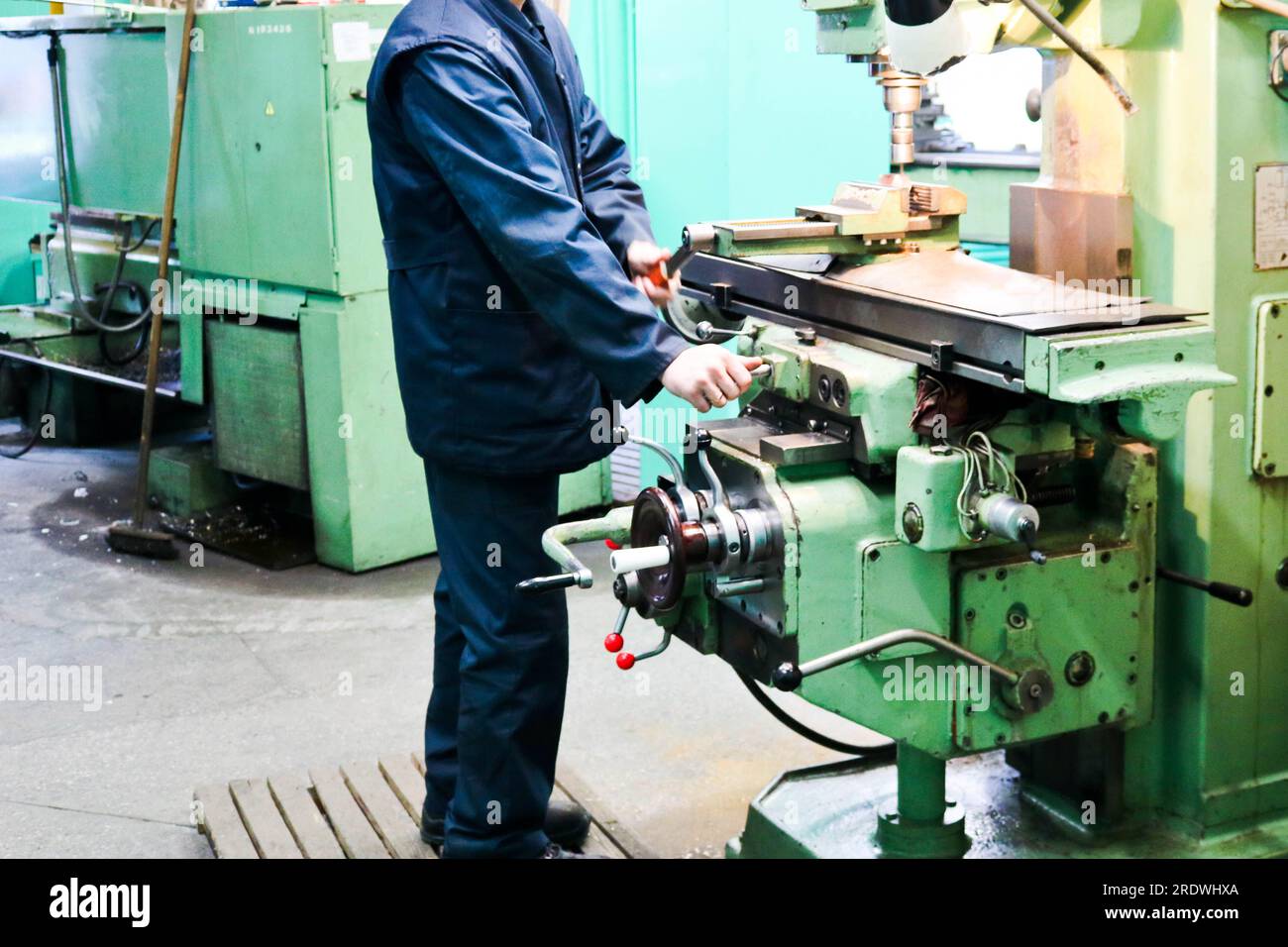 Worker turning wood in lathe hi-res stock photography and images - Alamy