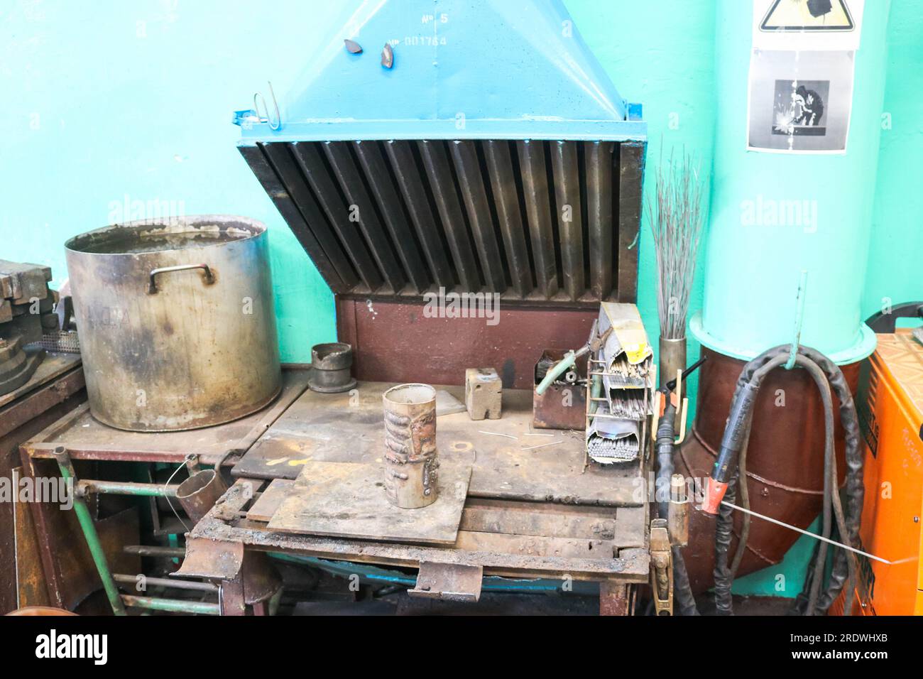 Welding post, table for work of a welder in a workshop at a ...