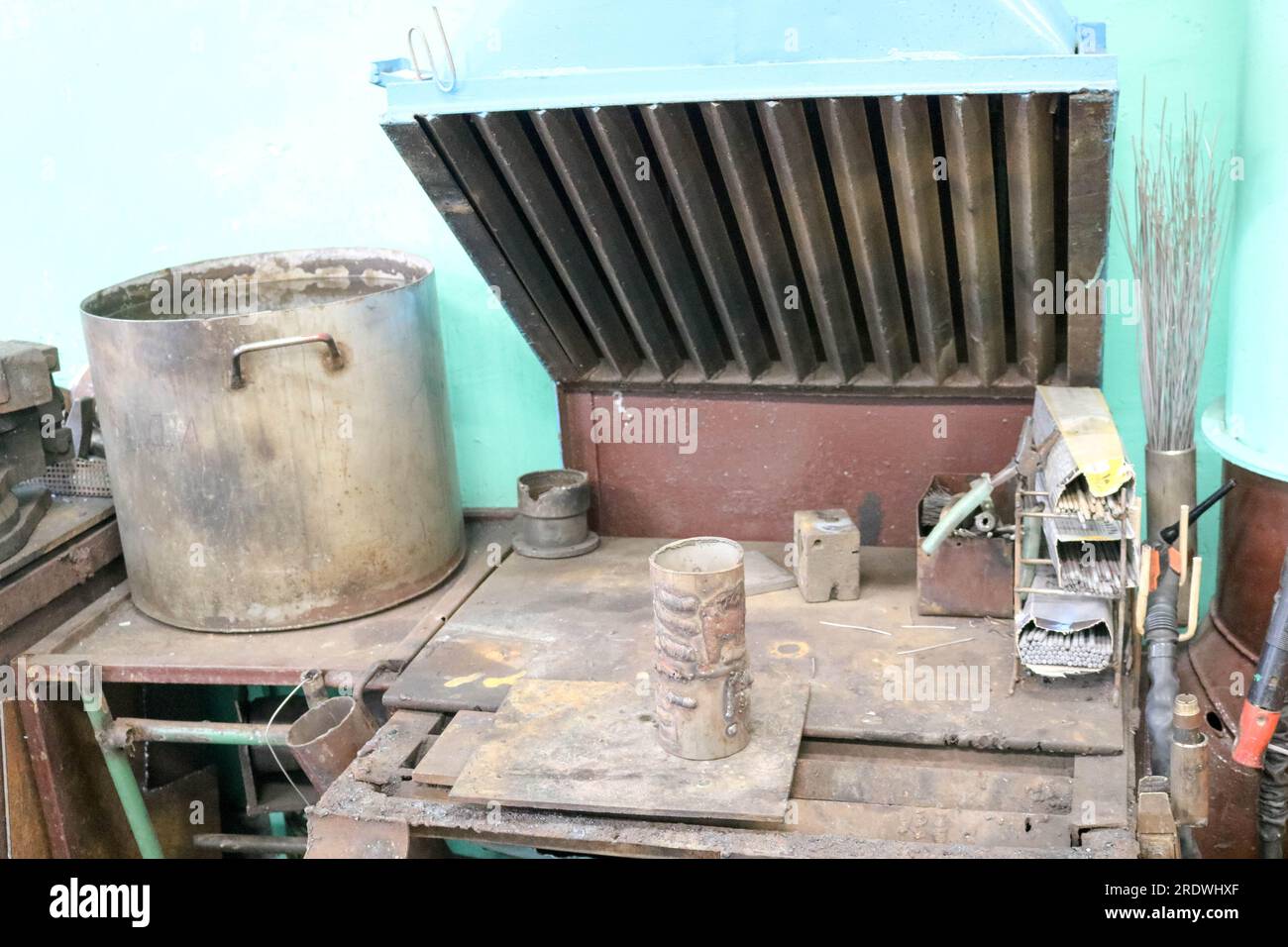 Welding post, table for work of a welder in a workshop at a ...