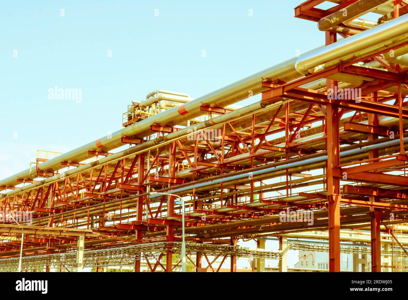 Pipeline trestle with iron rusty pipes for pumping liquid, condensate ...