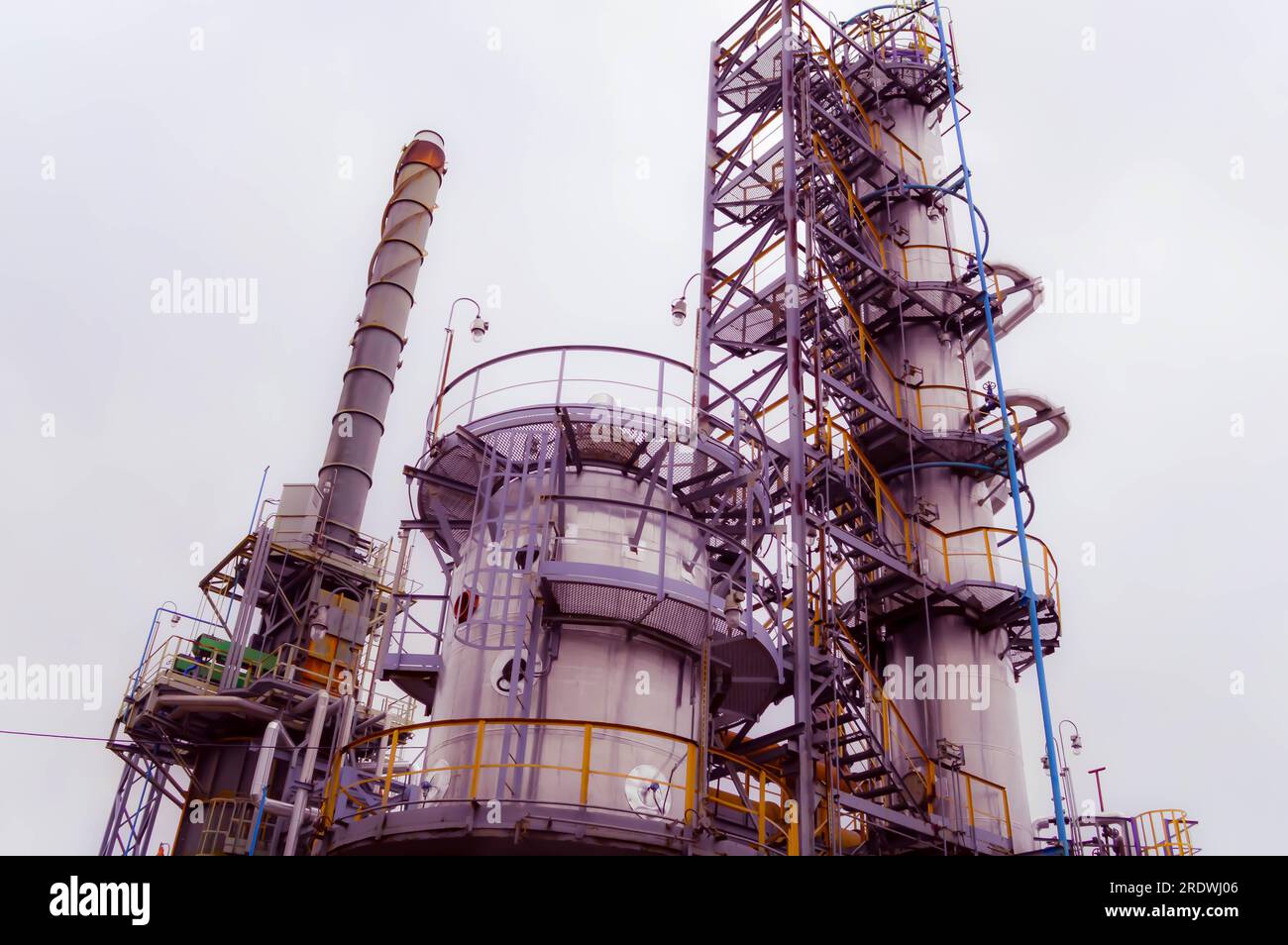 Installation for processing oil with columns and pipes. Refinery Stock ...