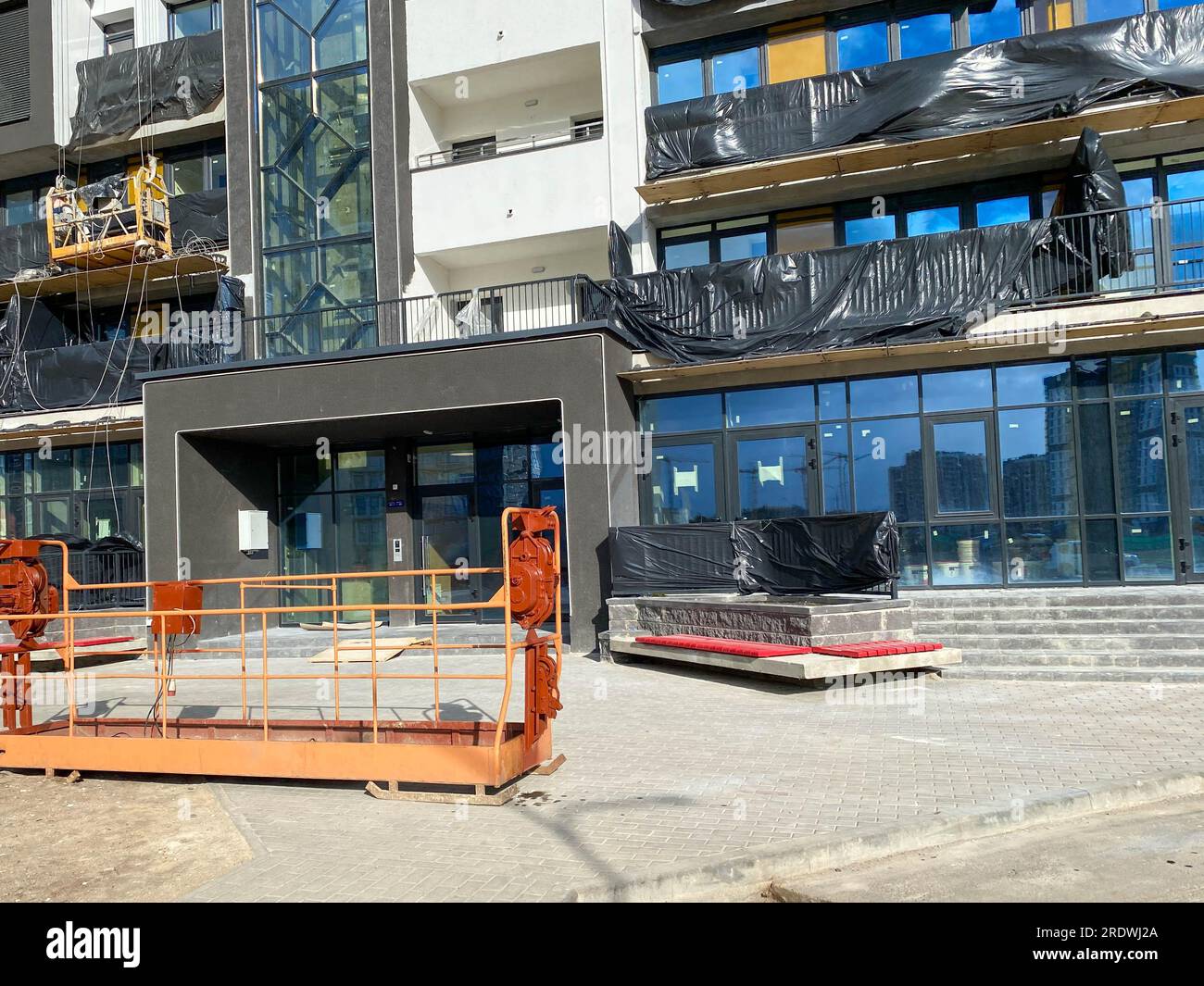 Construction cradle near the new lady of the new building in the film ...