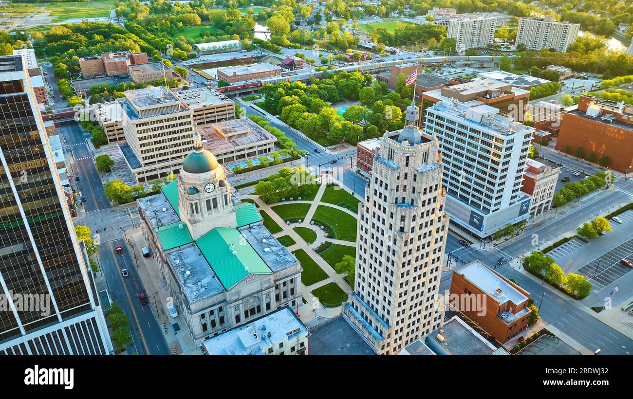 Aerial downtown Fort Wayne IN courthouse, Freimann Square, USA flag ...
