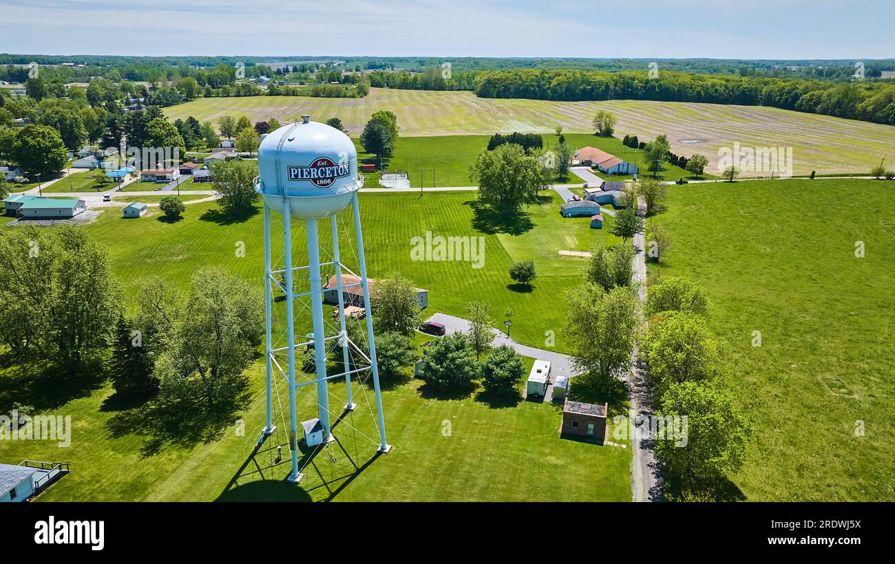 Summer green aerial Pierceton Indiana water tower rural houses, farms ...