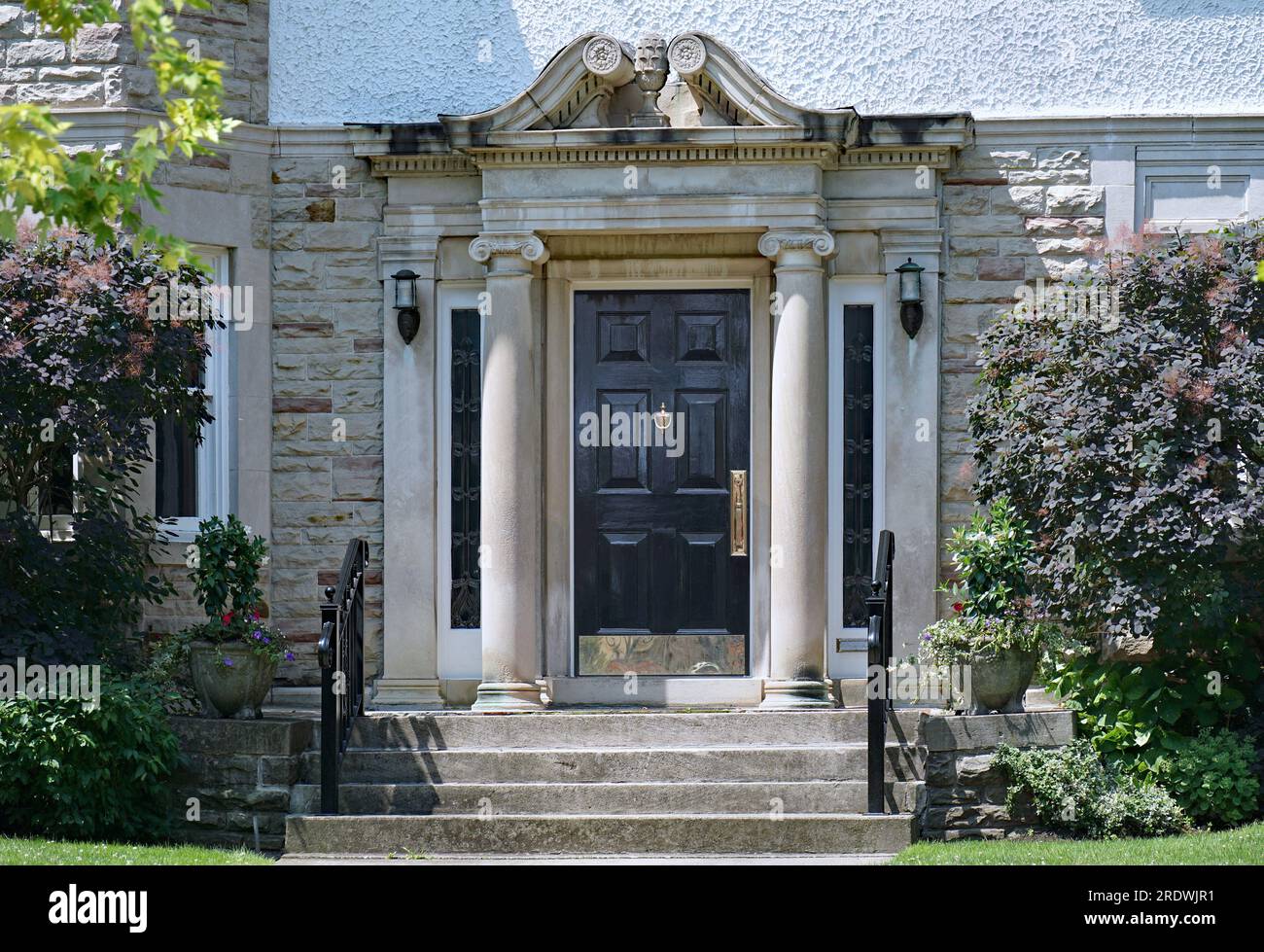 Elegant front door classical style stone columns Stock Photo - Alamy