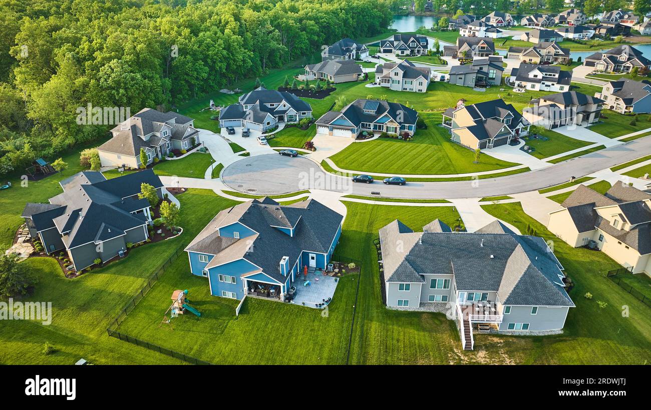 Cul-de-sac in rich mini-mansion neighborhood houses with lakes aerial ...