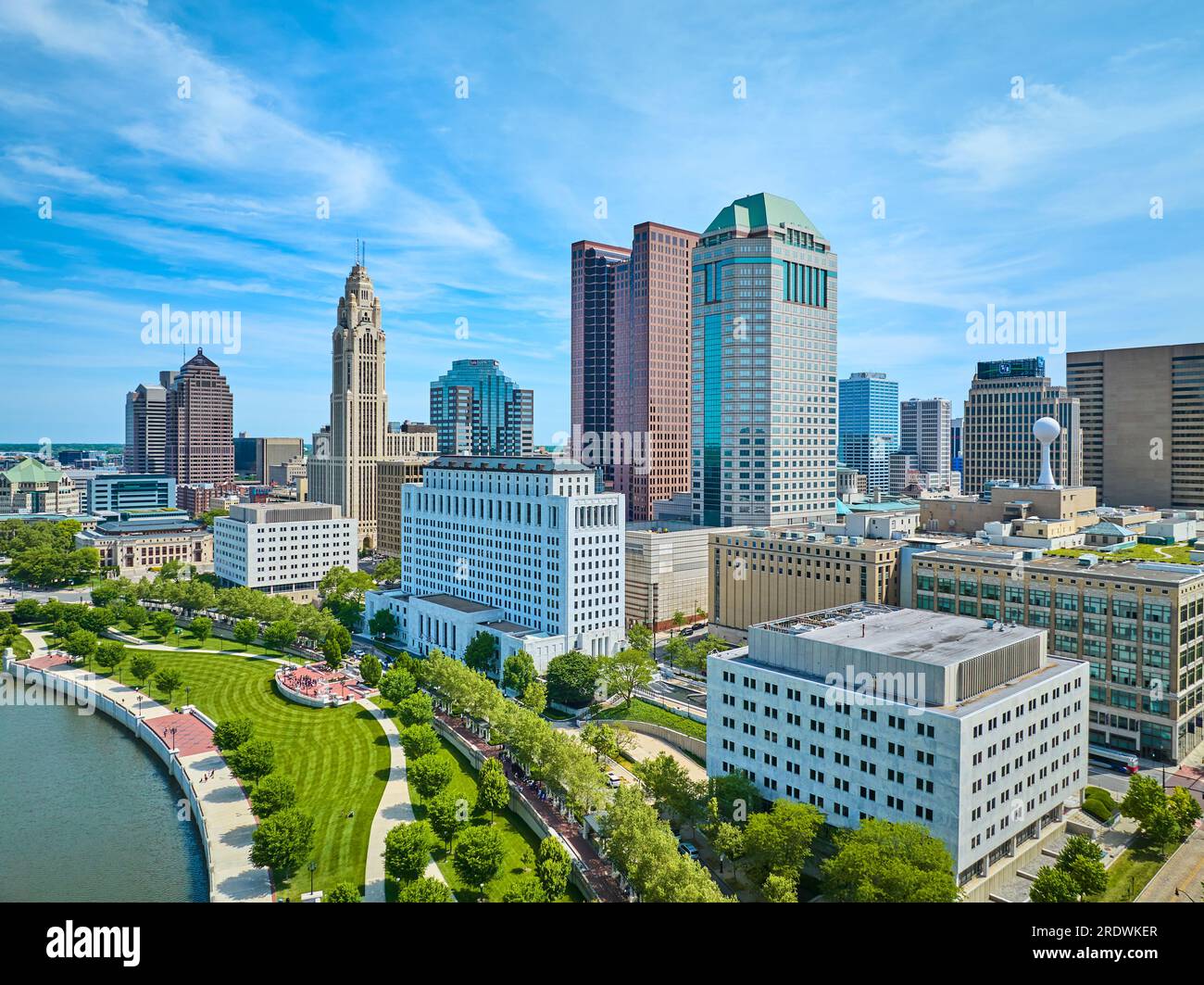 Columbus Ohio downtown aerial with summer blue sky and green promenade ...