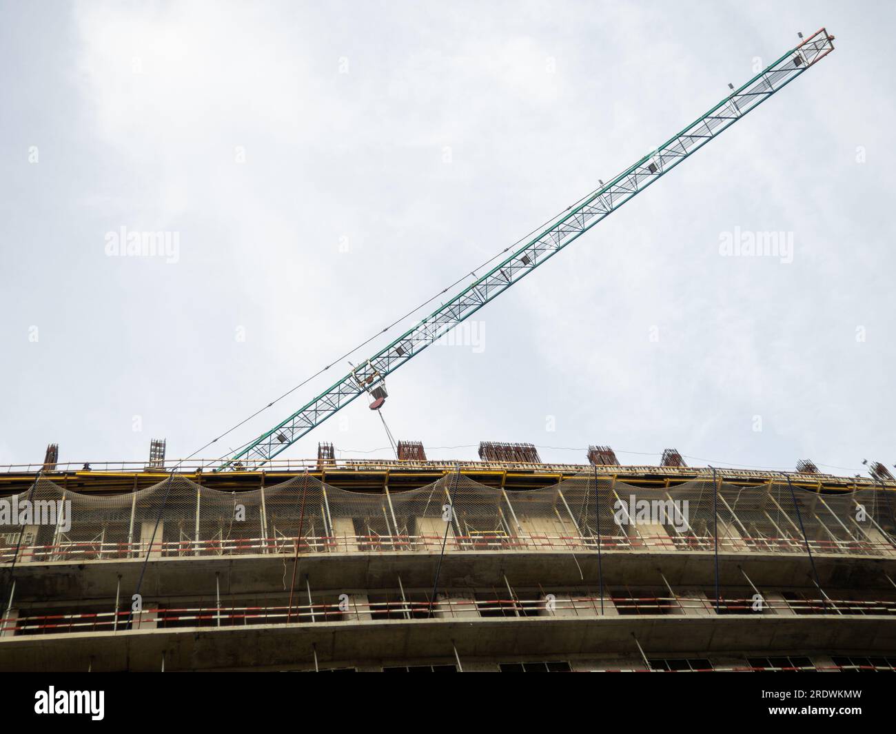 Construction of a tall building. Safety net at a construction site ...