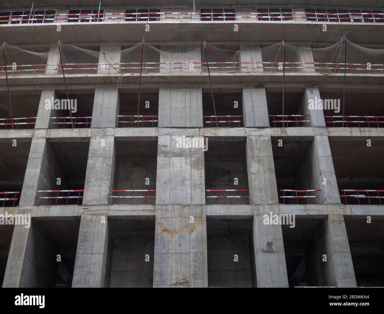 Construction of a tall building. Safety net at a construction site ...