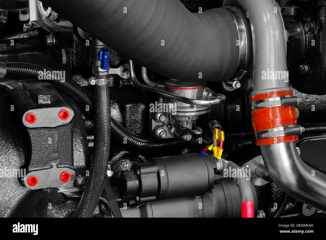 Black diesel engine. Fragment of a diesel motor close-up. Selective on ...