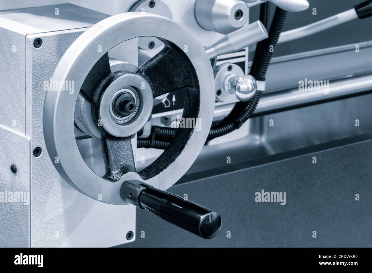 Lathe control knobs close up blue tone. Metal machine tools industry ...