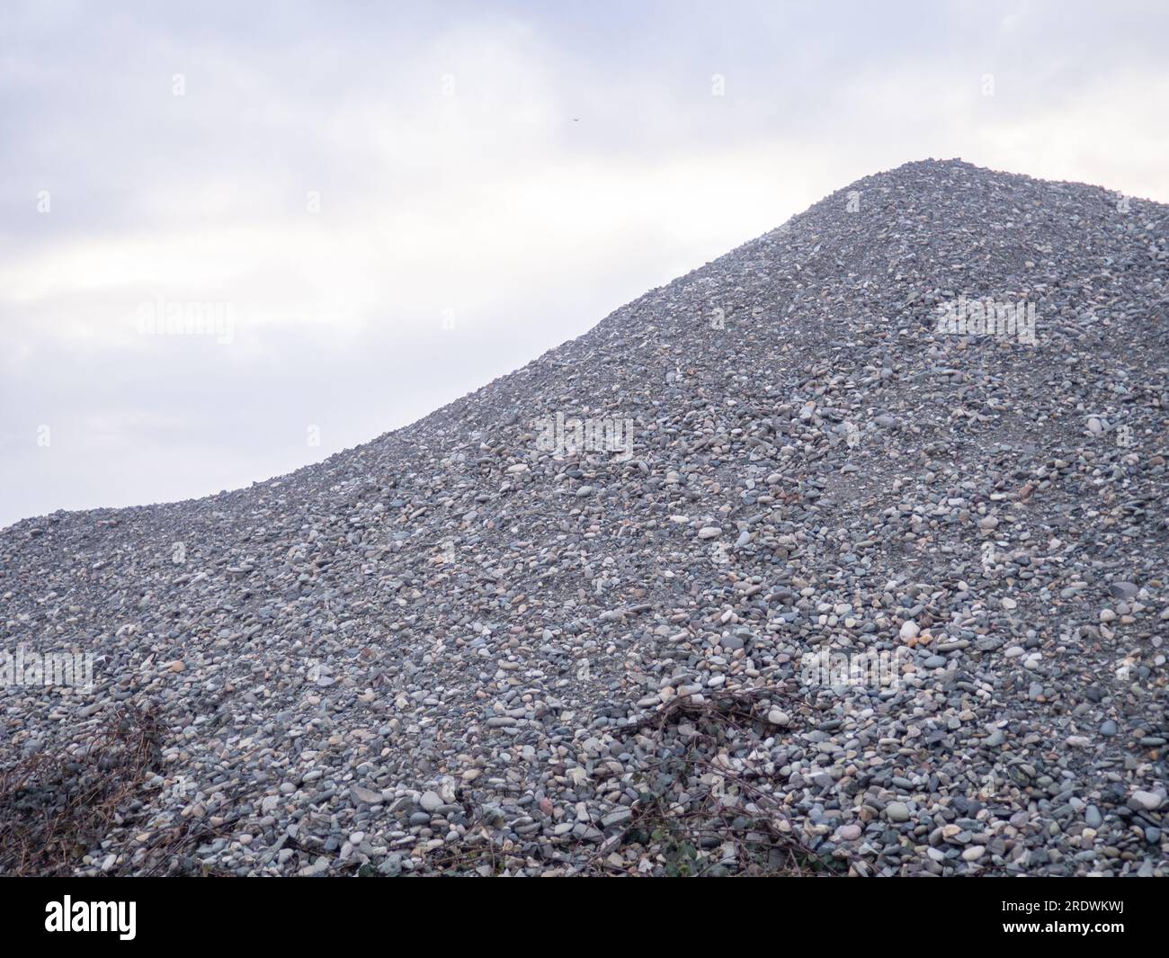 Mountains of rubble. Gray background. Construction material. Crushed ...