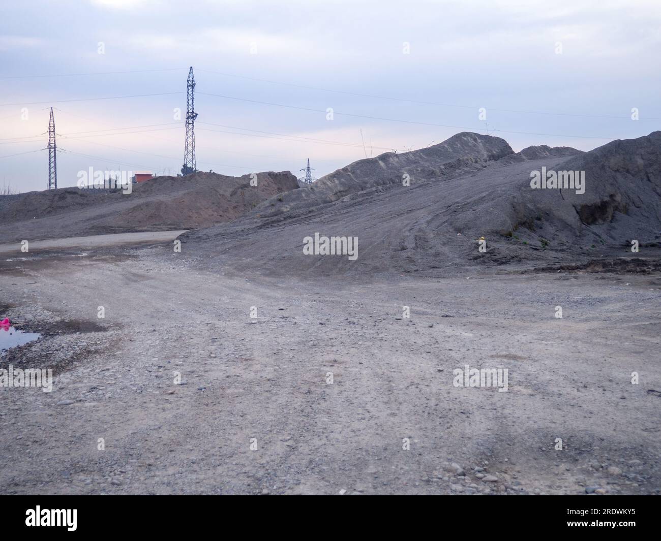 Mountains of rubble. Gray background. Construction material. Crushed ...