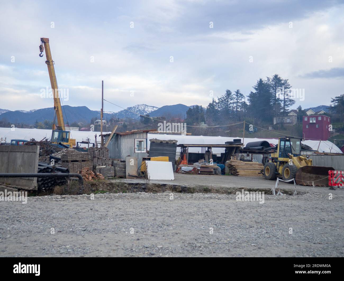 Construction site. Location of builders. Work shift is over. Truck ...