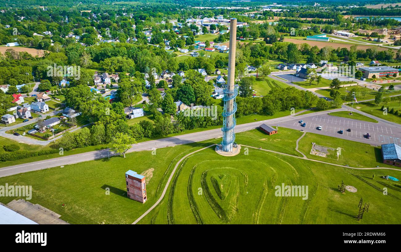 Drone view of Rastin Observation Tower with distant houses and ...