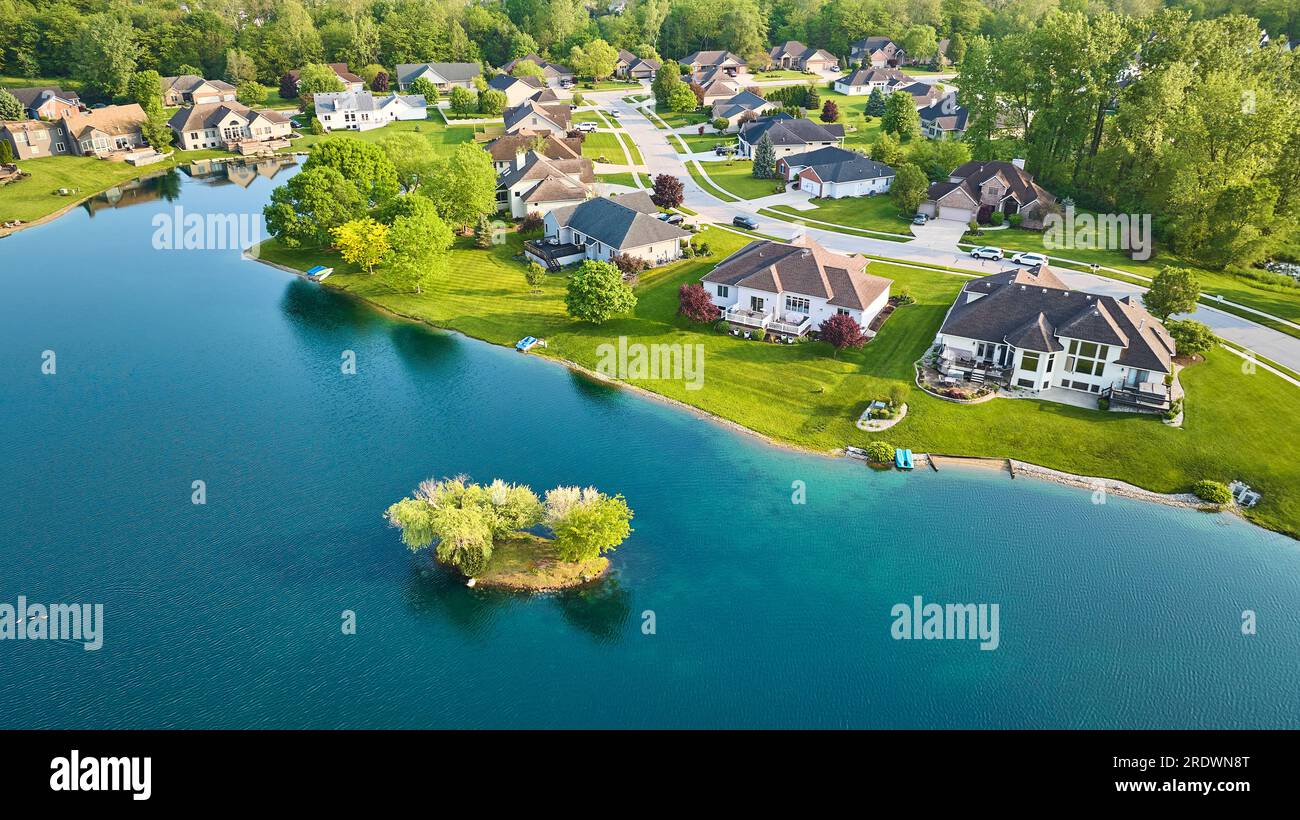 Pond with small island in rich mini mansion housing addition million ...