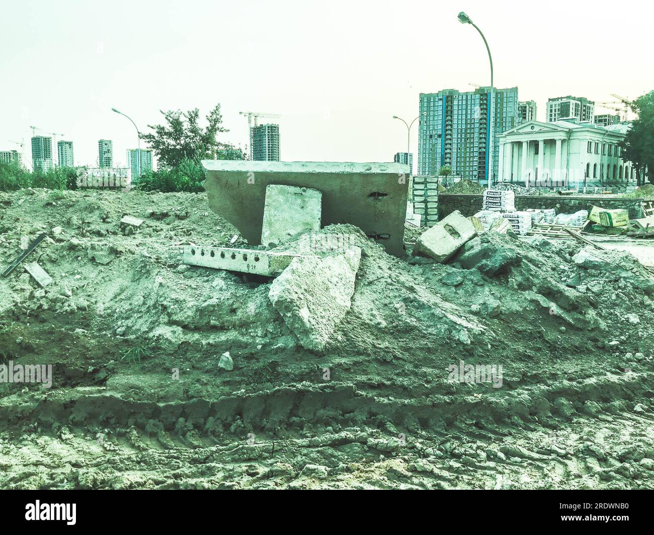 construction landscape. building materials, pieces of concrete, metal ...