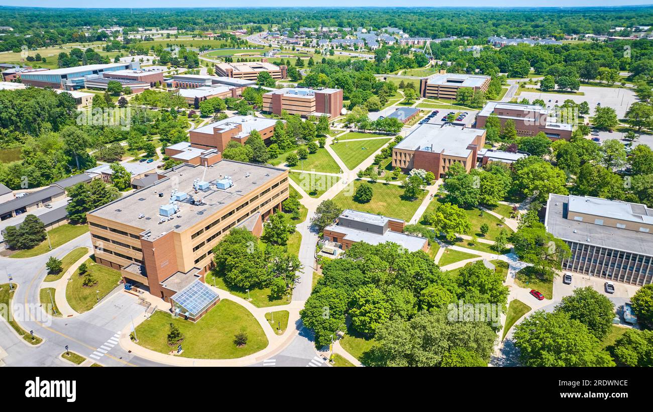 Aerial bright summer day over PFW campus buildings and college dorms ...