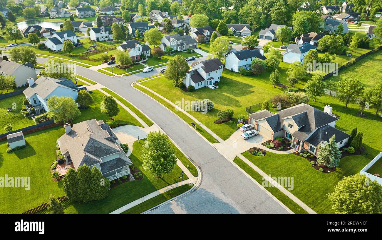 Landscaping on middleclass homes aerial neighborhood fresh cut lawns ...