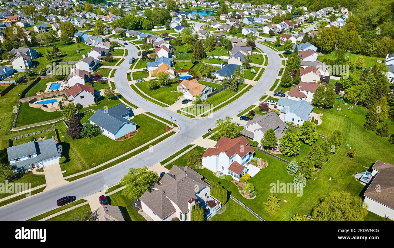Lots of houses in giant neighborhood with various roof and siting ...