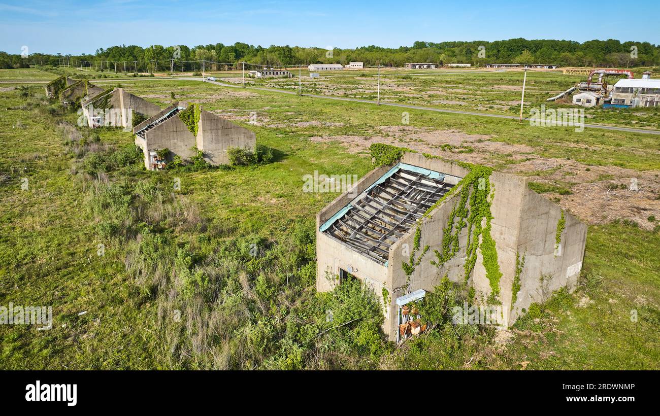 Unknown lost village same concrete buildings repeated in decay, ivy ...