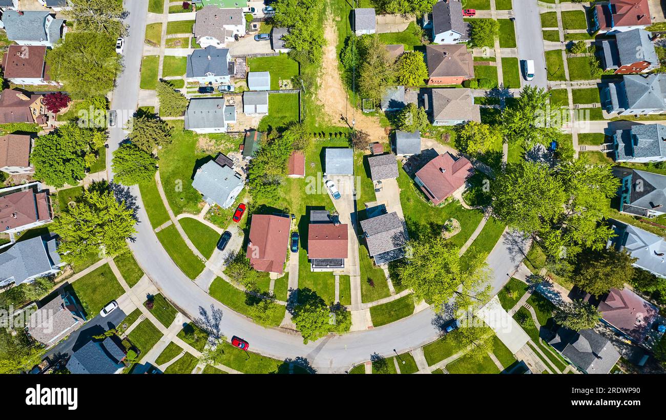Summer green lawns curved road with houses neighborhood village town ...