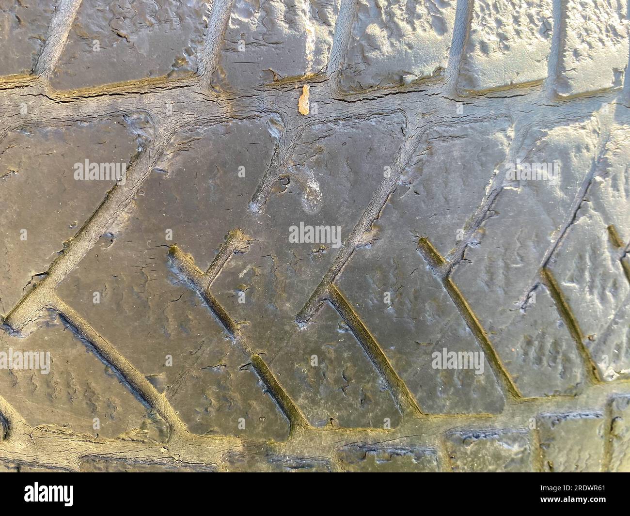 Bad black worn out bald tires on wheels and tires for a car with an end ...