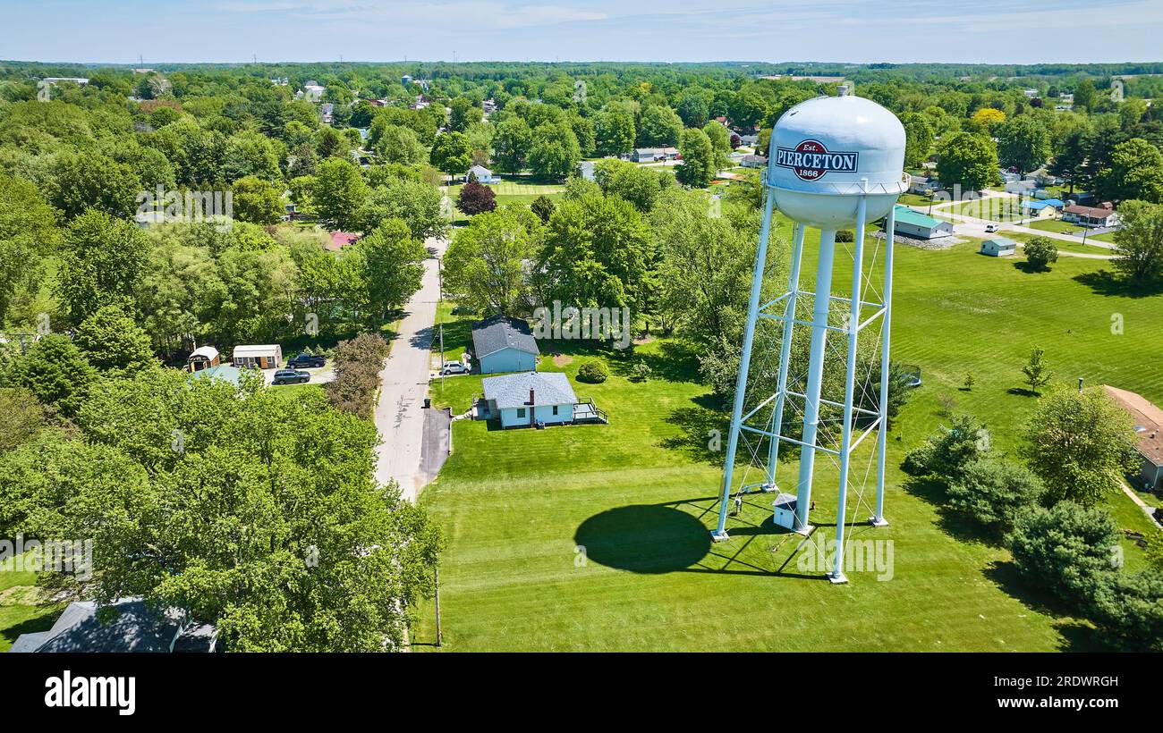 Aerial Pierceton Indiana water tower with rural houses, neighborhood ...