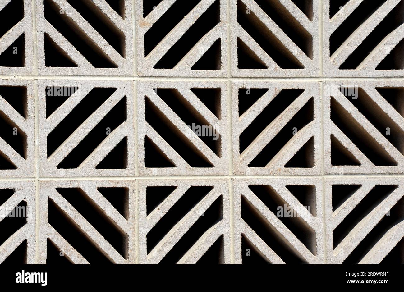Concrete wall pattern includes diamond, criss-cross and X design. Wall ...