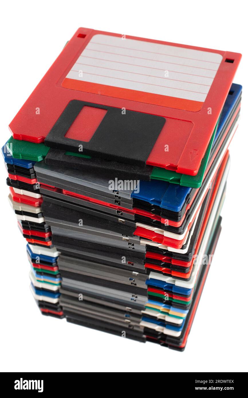 Colored old retro floppy diskettes in stack. Isolated on white ...