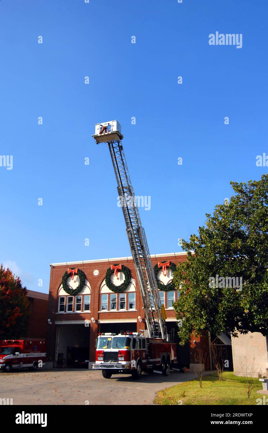 Ladder is extended on fire department truck making repairs. Fire ...