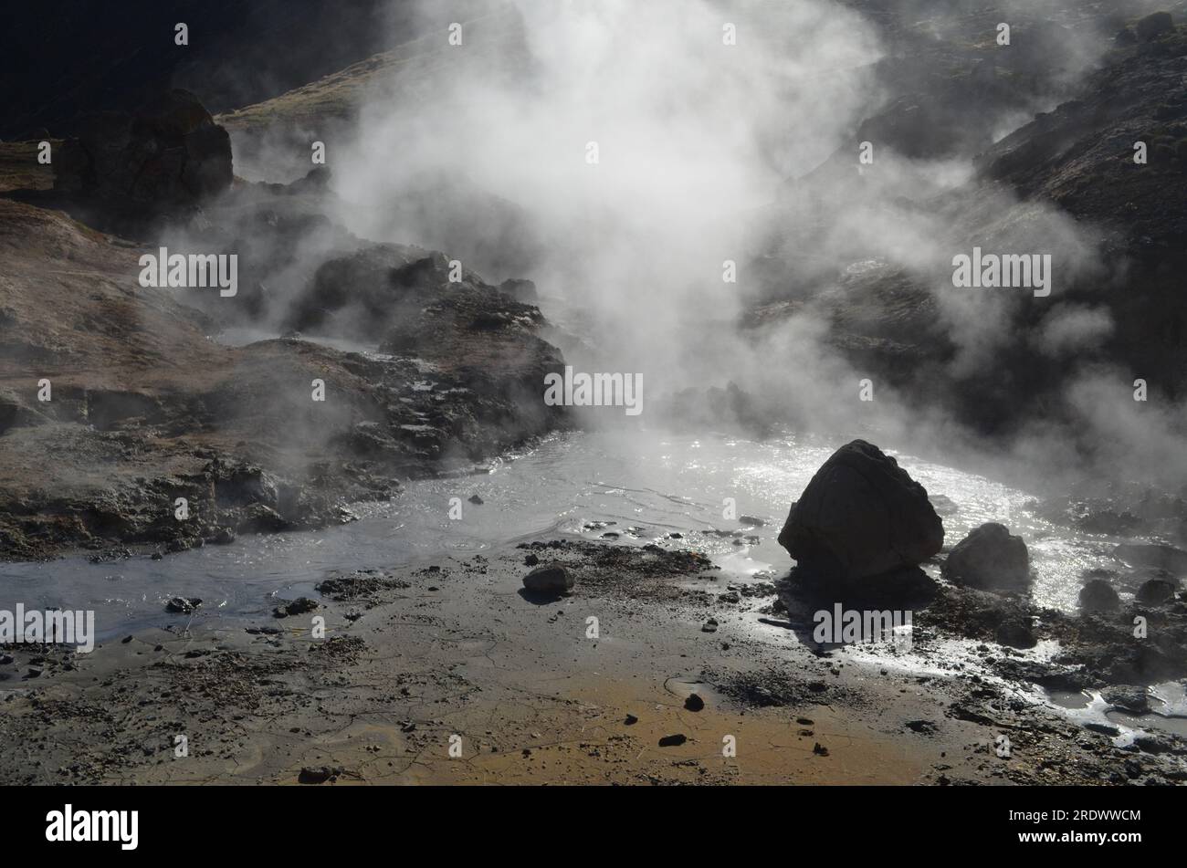Amazing geological landscape with hot steam vapors rising from land ...