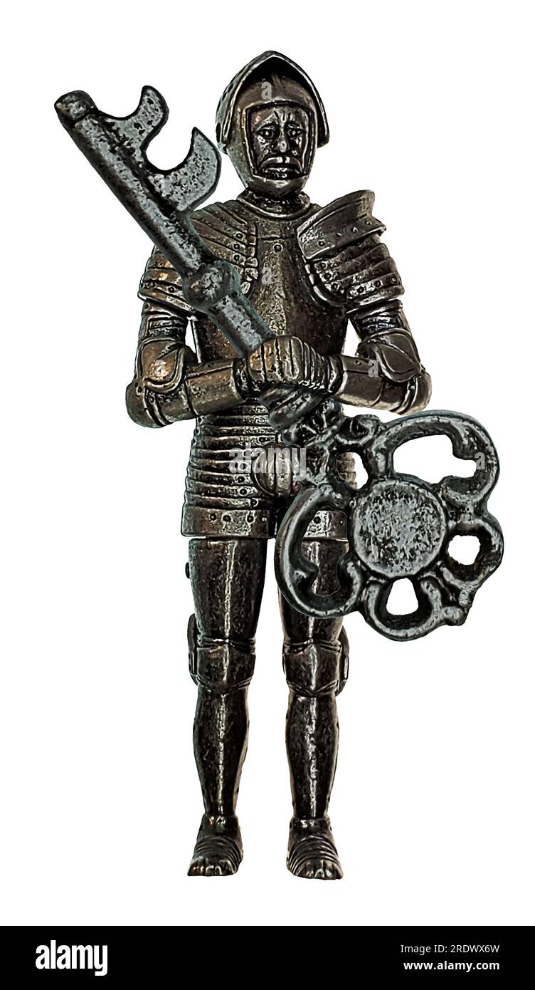 Knight on guard holding a key Stock Photo - Alamy