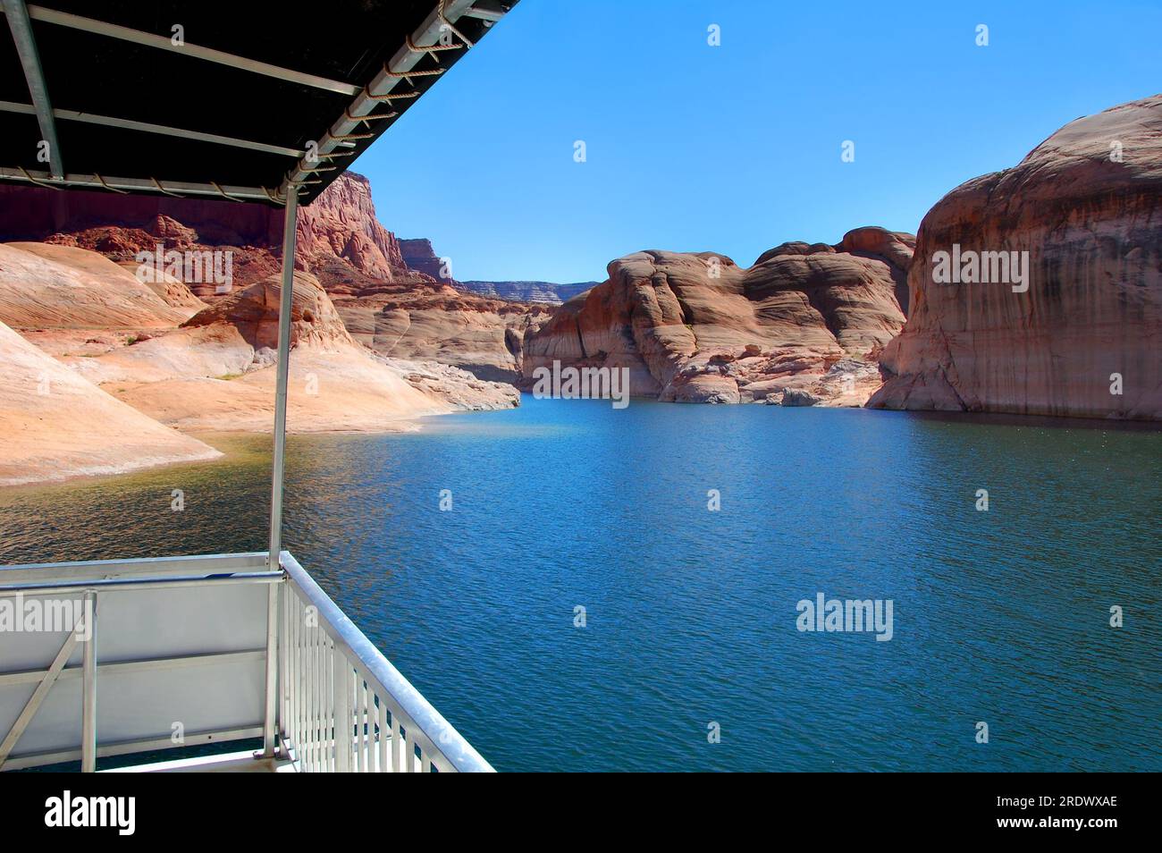 This houseboat has a view! Beautiful sandstone rocks and steep cliffs ...