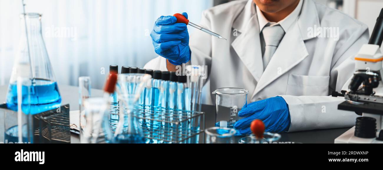 Doctor working biochemistry analyzer in hi-res stock photography and ...