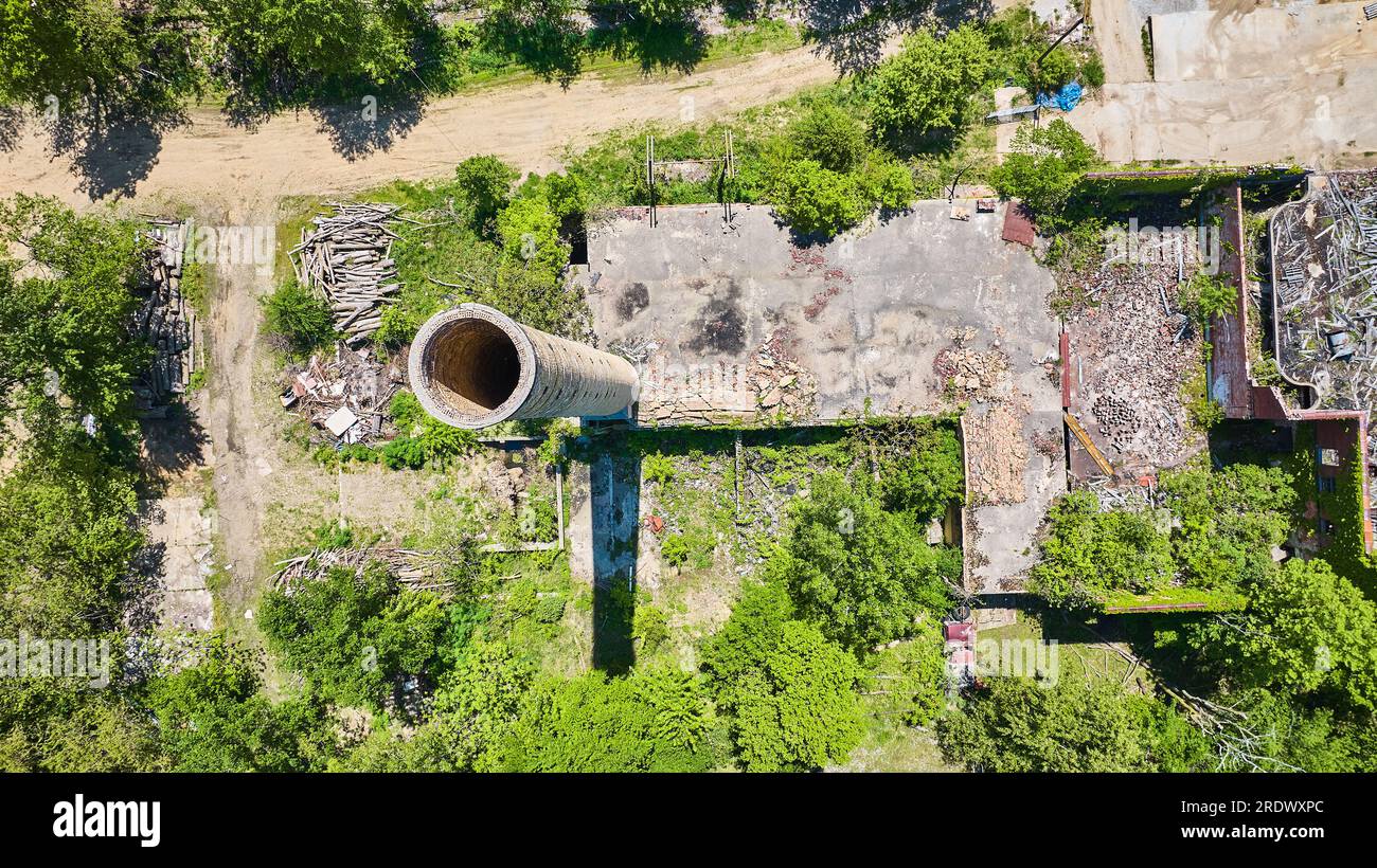 Dark ring from old silo smokestack in abandoned decaying destroyed ...