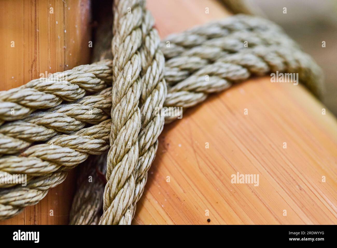 Thick rope wrapped around bamboo poles hi-res stock photography and ...