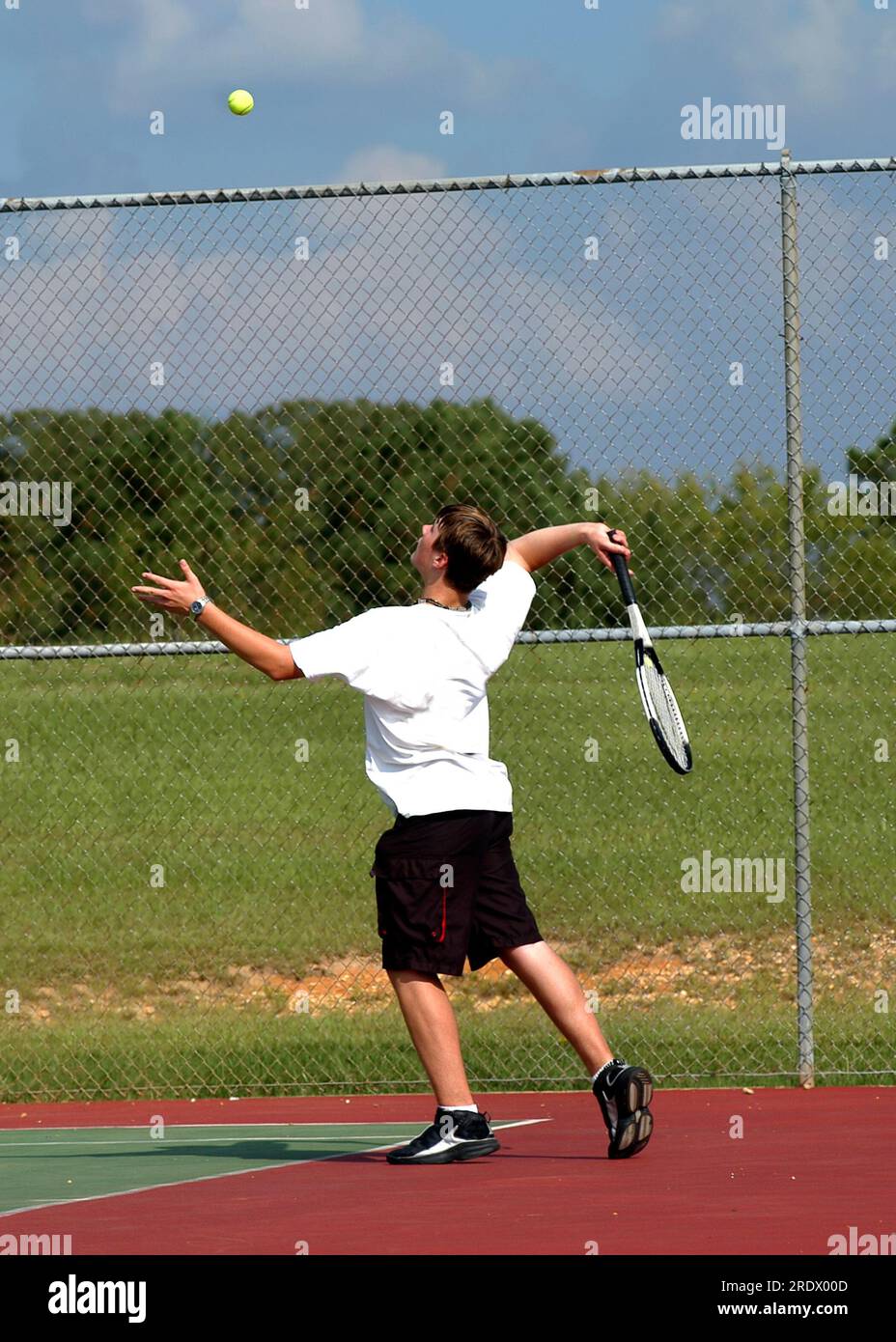 Boy watching ball in air hi-res stock photography and images - Alamy