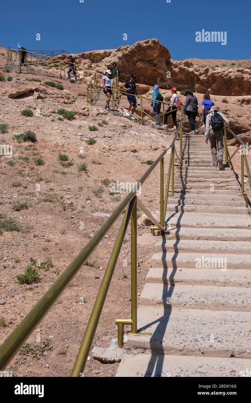 Kazakhstan, Charyn (Sharyn) Canyon. Visitors on Steps Near Visitor ...