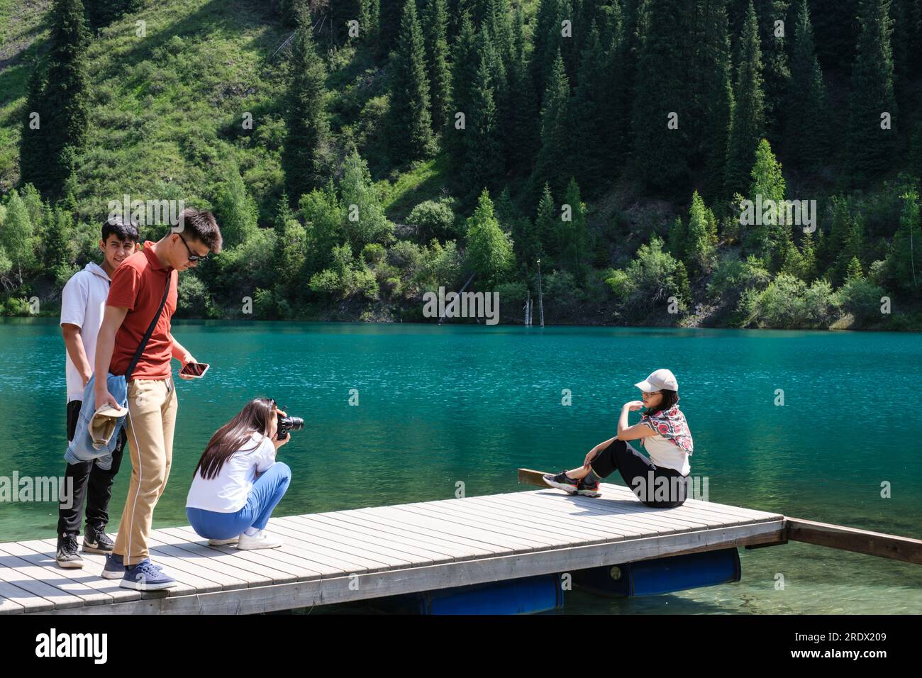 Kazakhstan, Kolsay Lakes National Park. Kaindy Lake. Visitors Posing ...