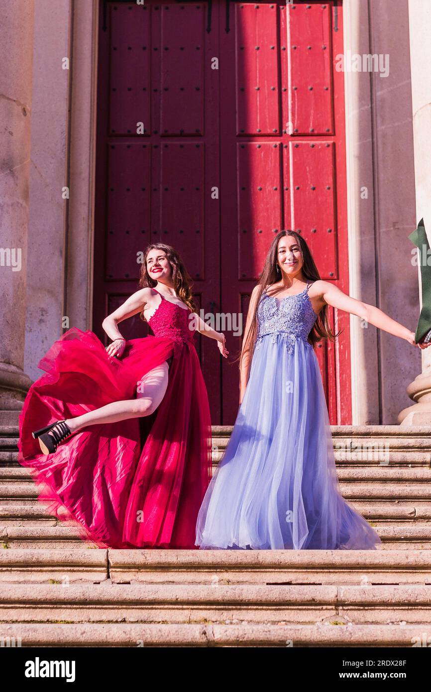 Young Hispanic Students happy celebrating success graduation with stole ...