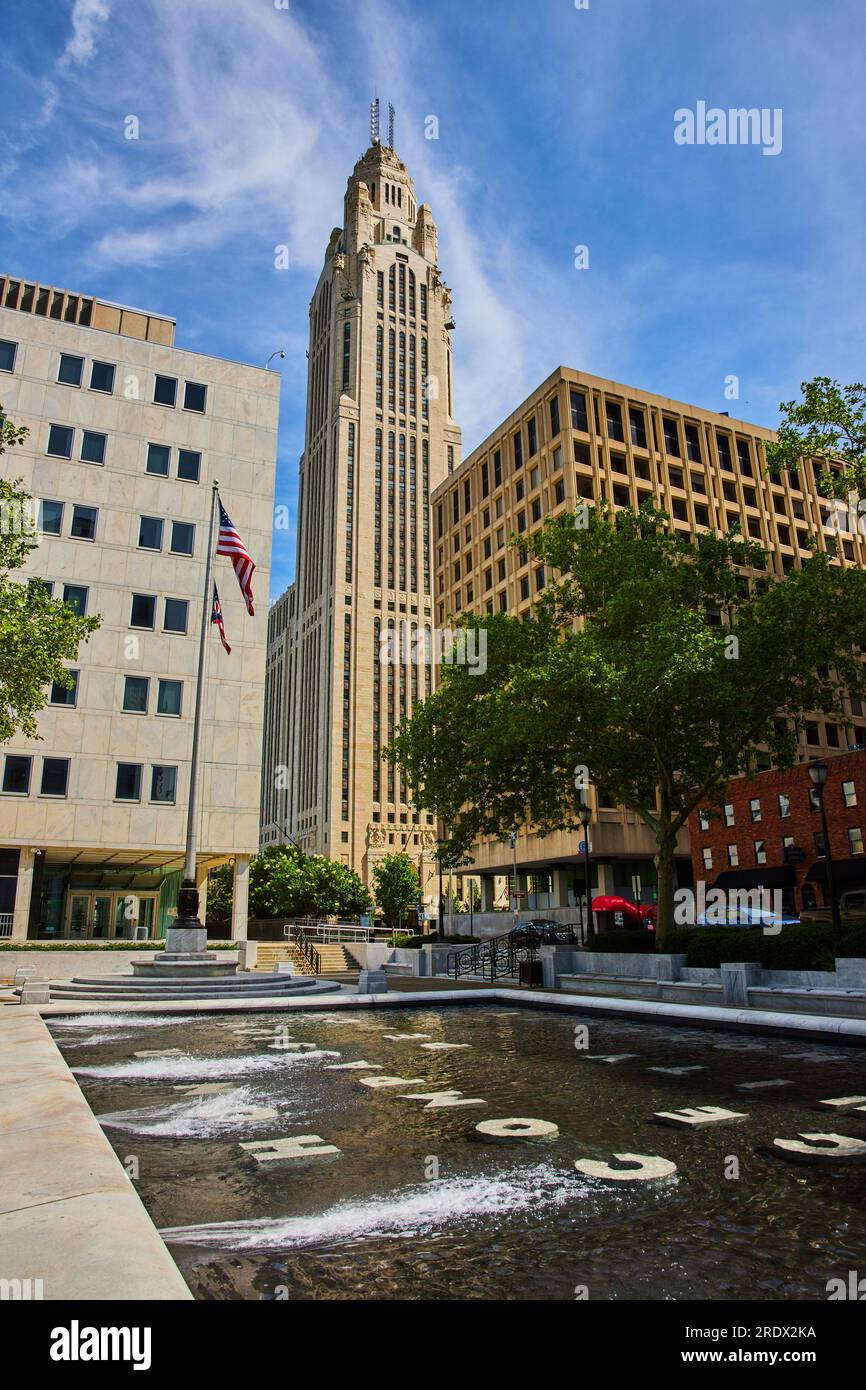 Stone words at bottom of fountain with American and Ohio flags and ...