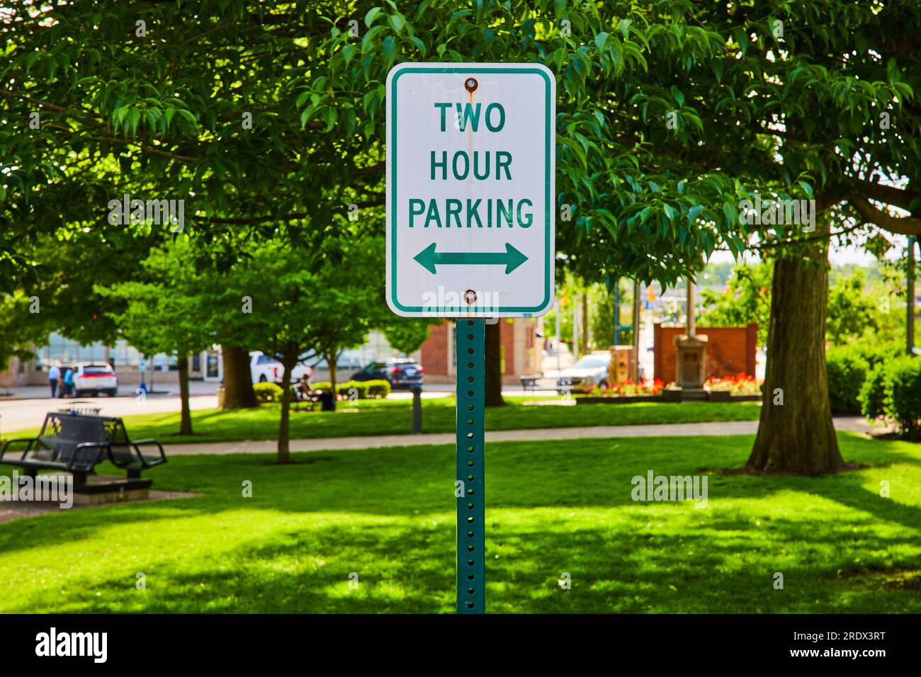 Green Two Hour Parking sign in front of Public Square park in Mount ...