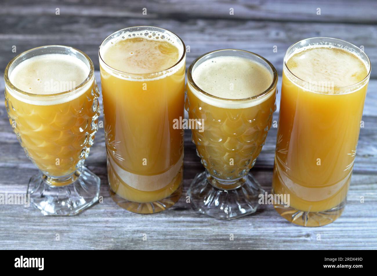 Sugarcane juice, the liquid extracted from pressed sugarcane. It is ...