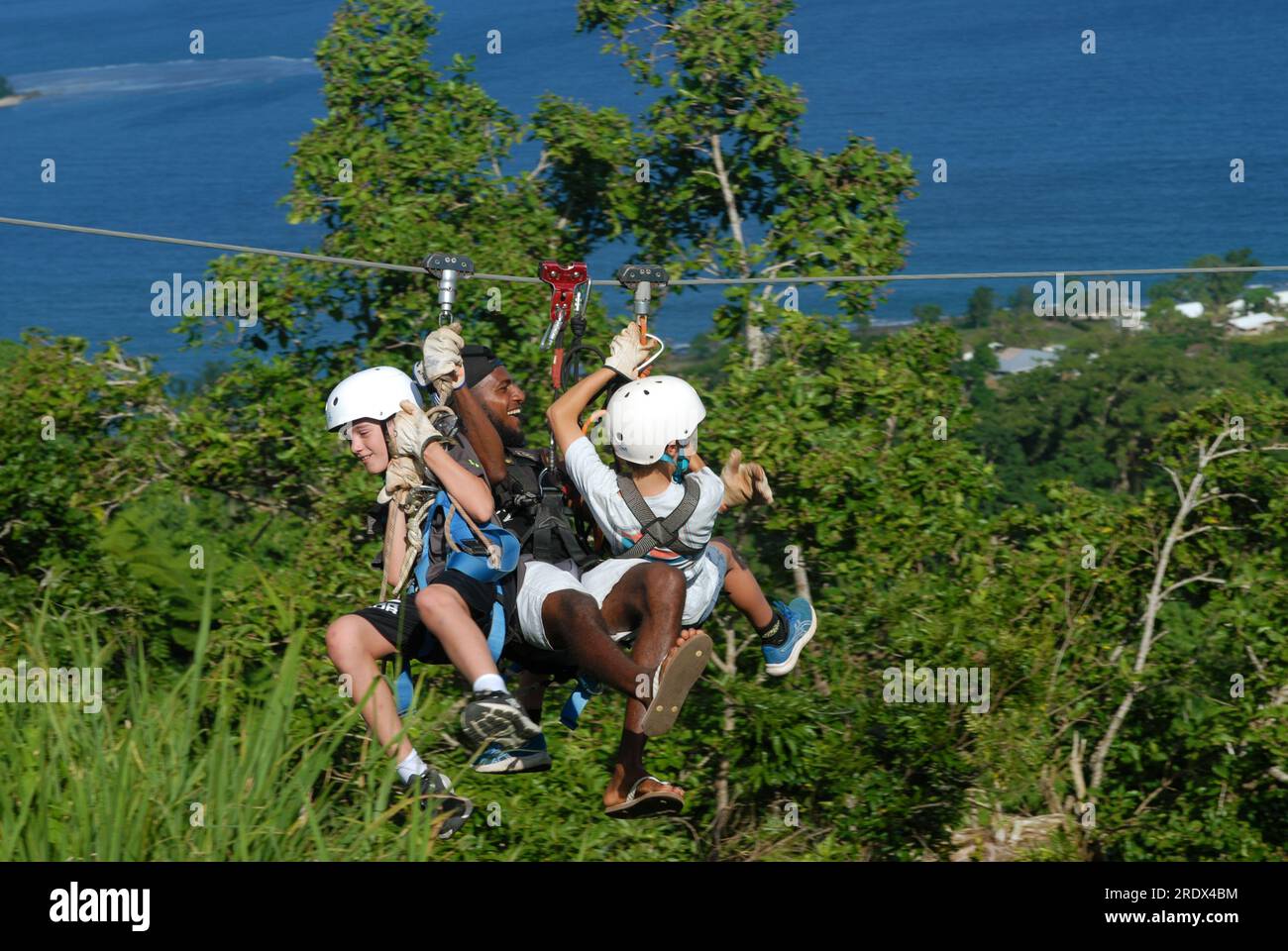 Tourists riding the zipline, Vanuatu Sky Bridge, Devil's Point Rd, Port ...