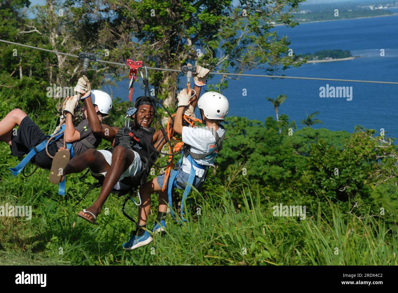 Tourists riding the zipline, Vanuatu Sky Bridge, Devil's Point Rd, Port ...
