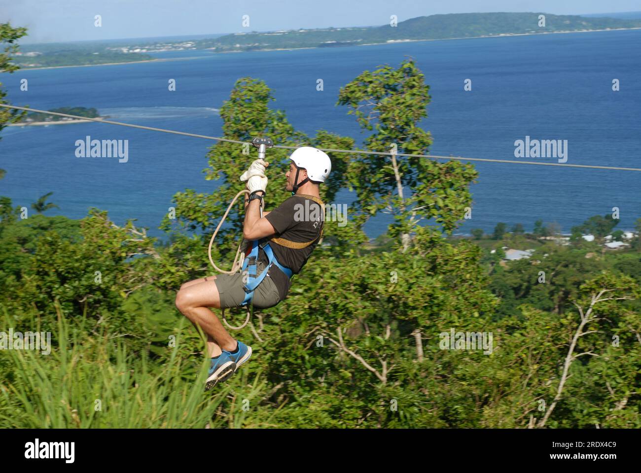 Tourists riding the zipline, Vanuatu Sky Bridge, Devil's Point Rd, Port ...