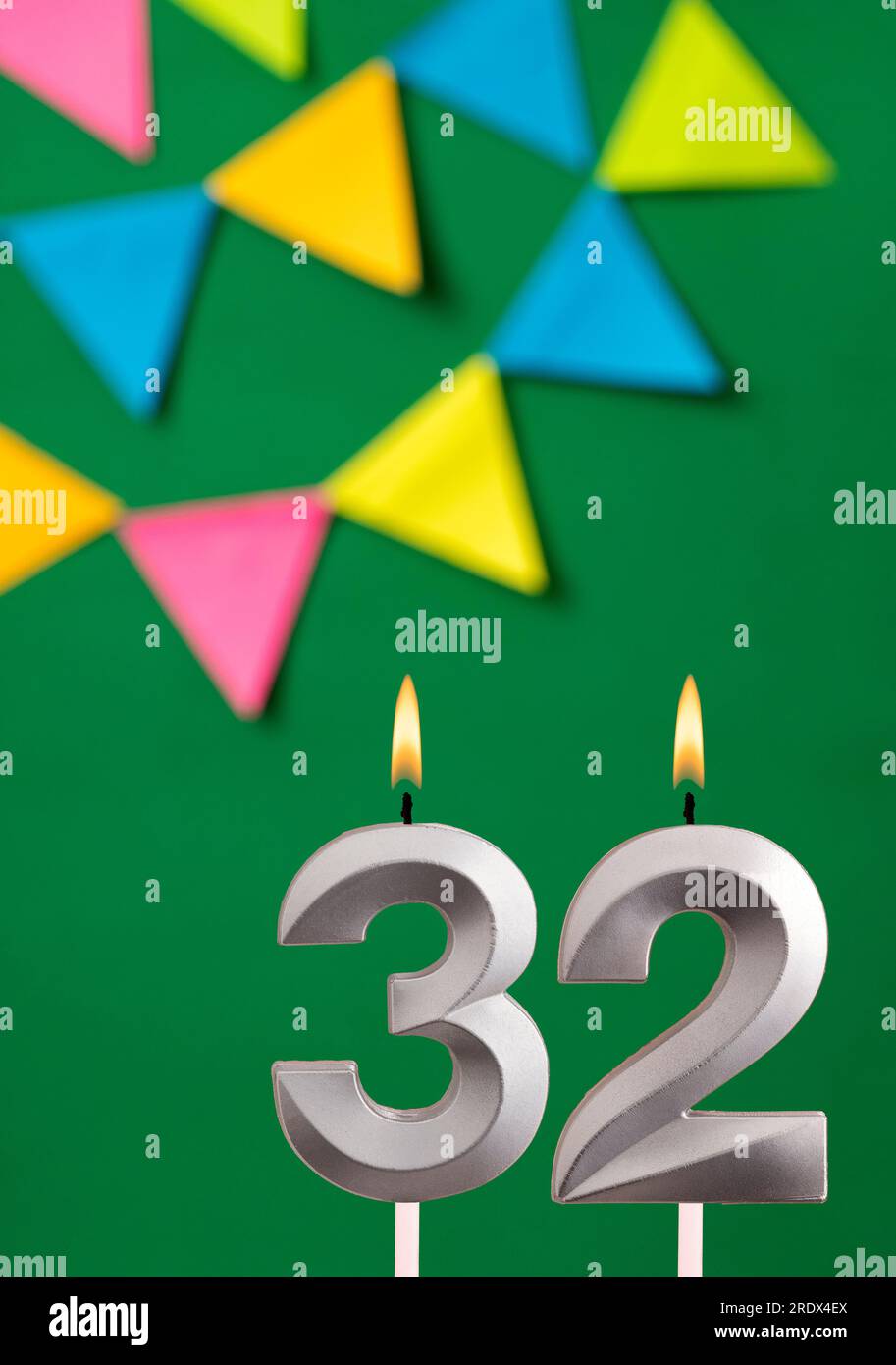 Vertical birthday card with number 32 candle - Green background with ...
