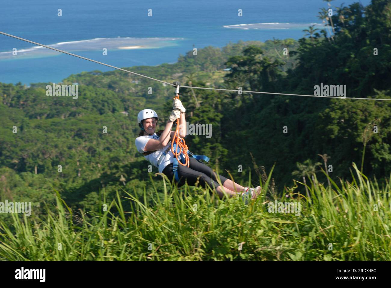 Tourists riding the zipline, Vanuatu Sky Bridge, Devil's Point Rd, Port ...