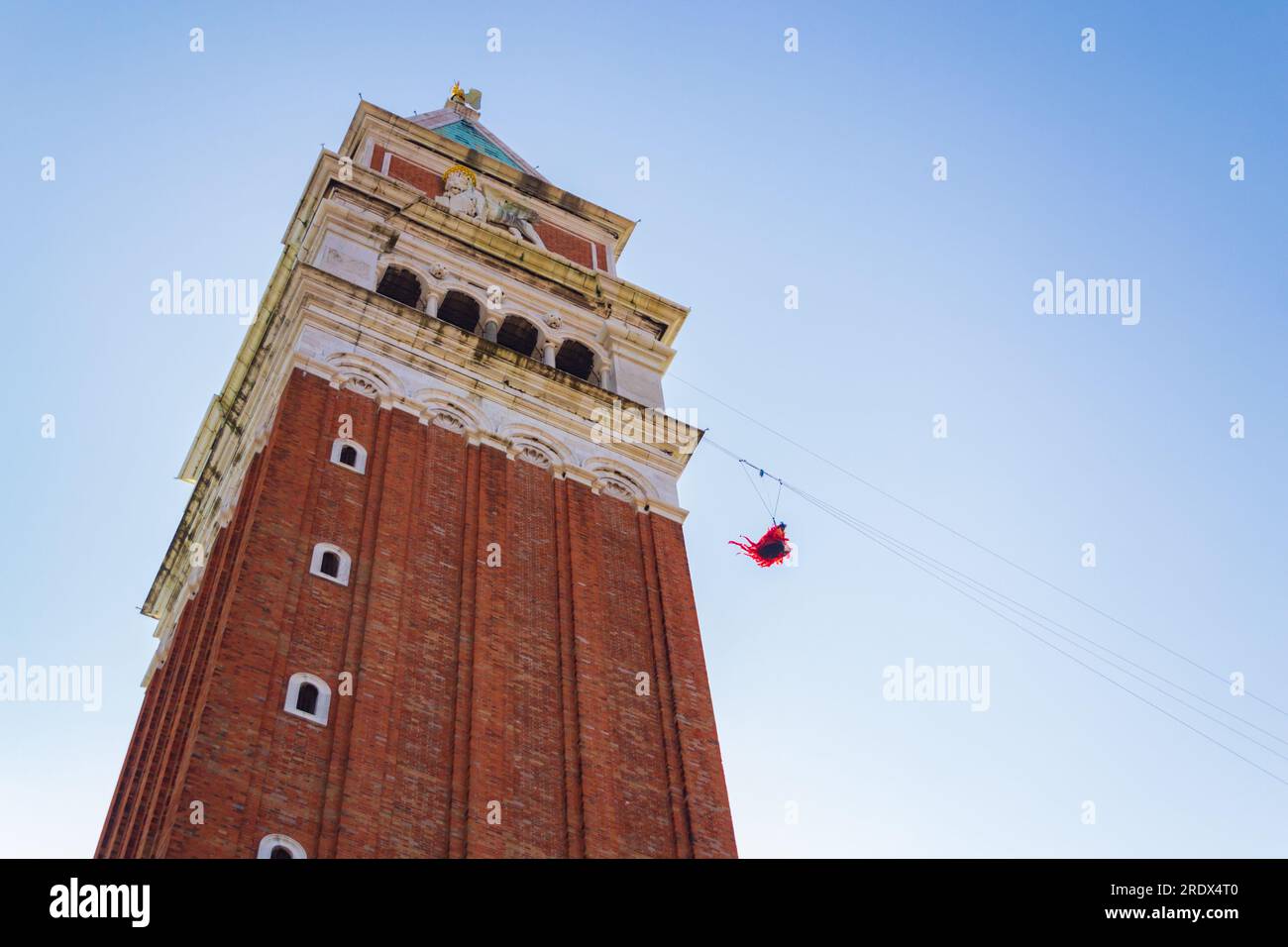 The Flight of the Angel” woman dressed with angel wings tied to a rope ...